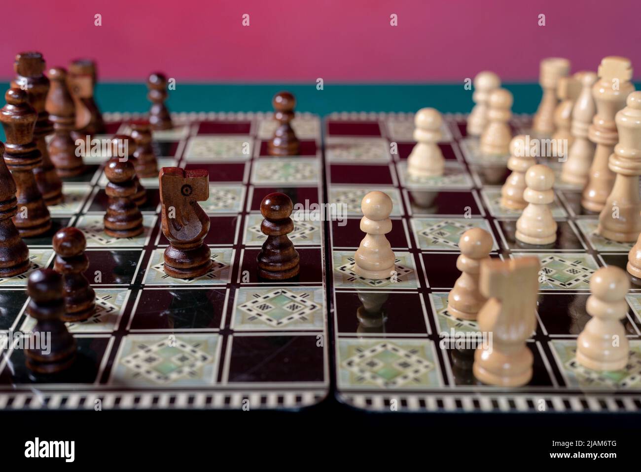 Board game with wooden pieces. Strategy game Stock Photo - Alamy