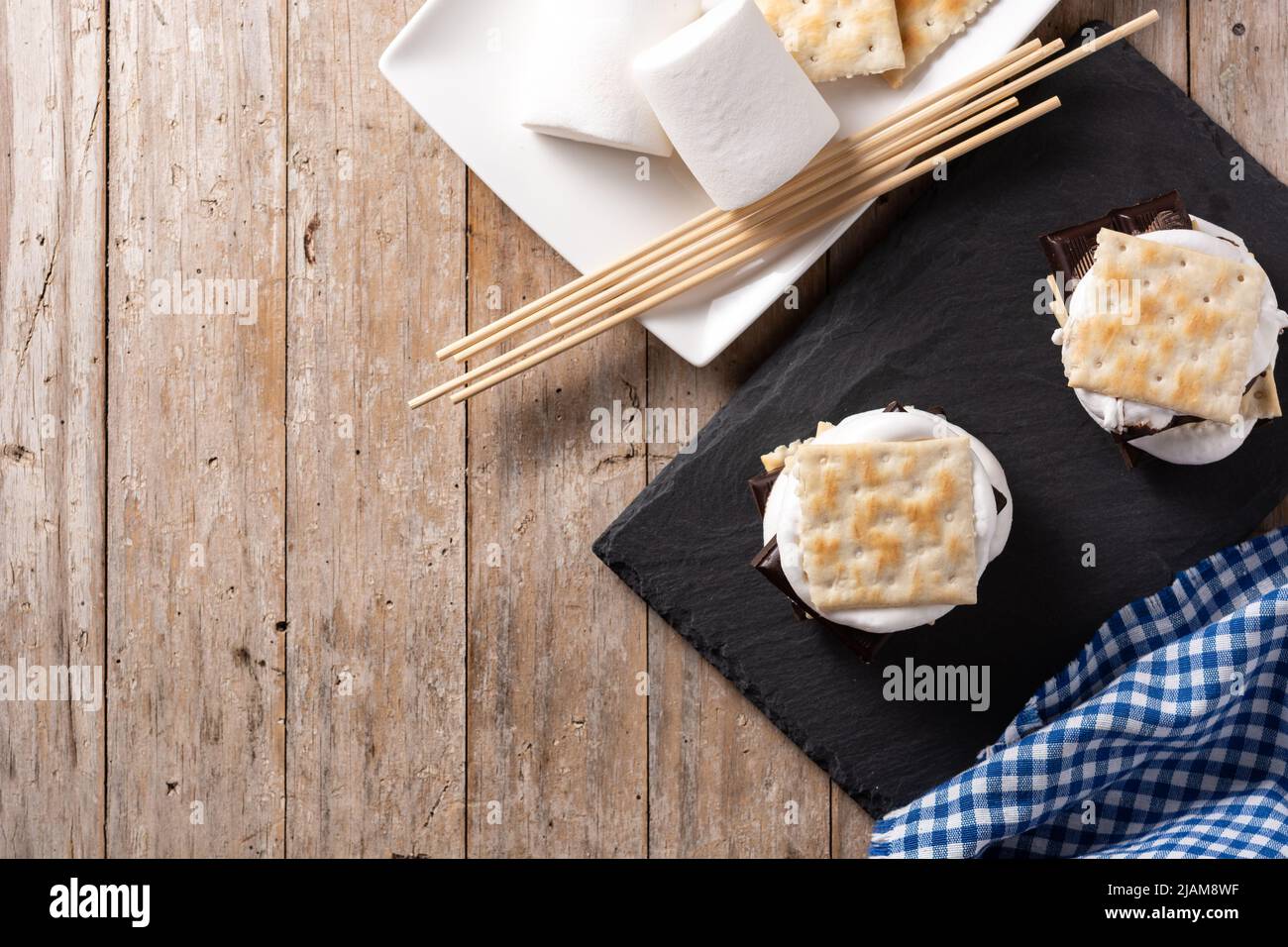 Homemade smores on wooden table. Typical American dessert Stock Photo ...