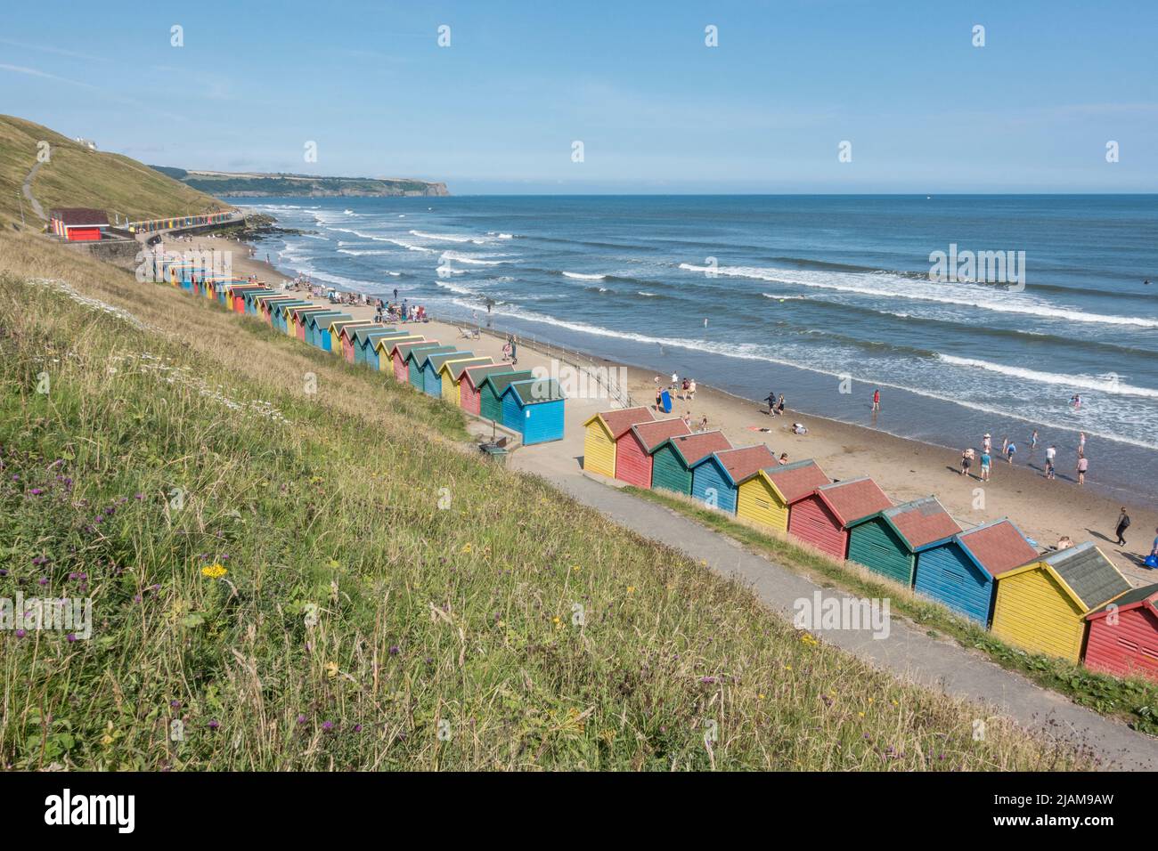 Colourful Whitby Beach Huts on the sea front in Whitby, North Yorkshire ...