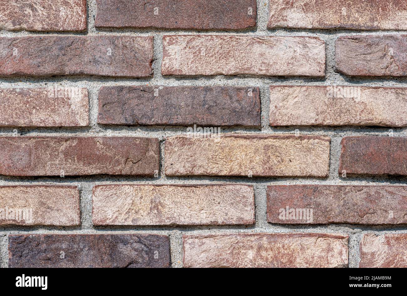 Background of rustic sandblasted bricks wall, sandblasted bricks ...