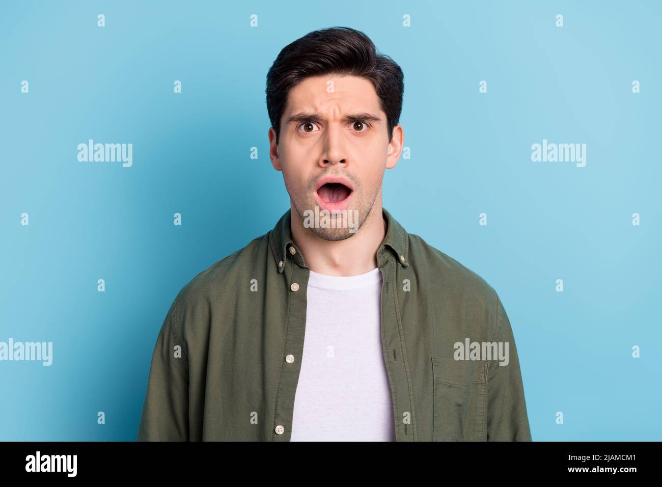 Portrait of shocked guy hear horrible covid 19 pandemic message shout ...