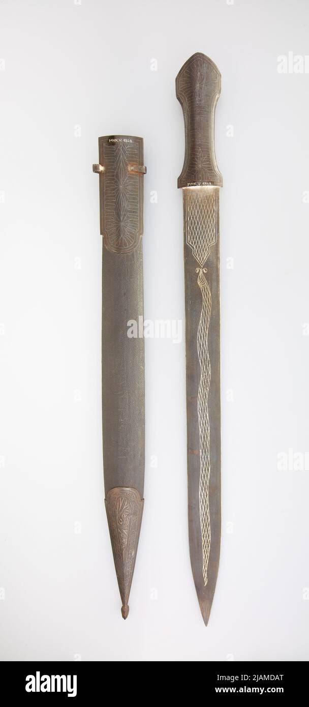 Long knife of kama type with a scabbard Stock Photo - Alamy