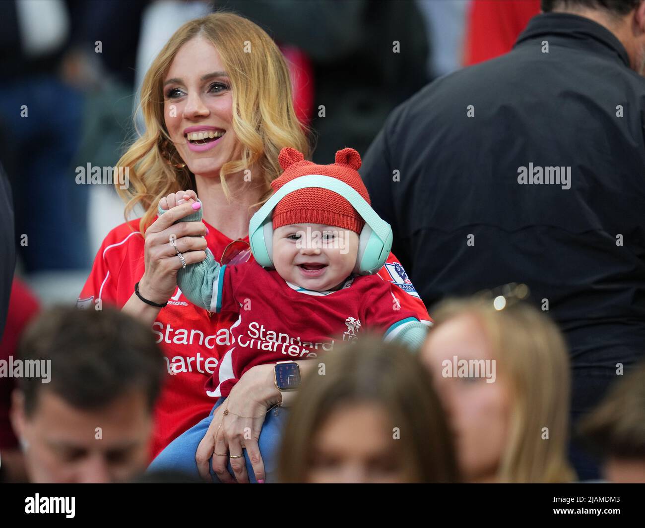 Liverpool’s baby fan with her mother during the UEFA Champions League ...