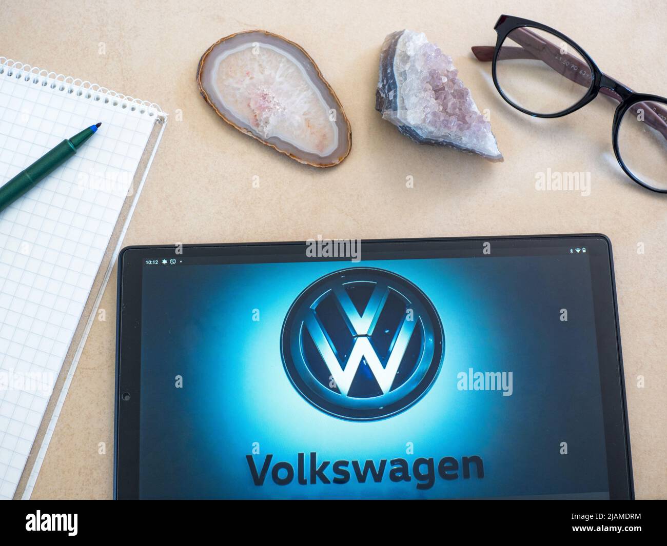 In this photo illustration, a Volkswagen Group logo seen displayed on a ...
