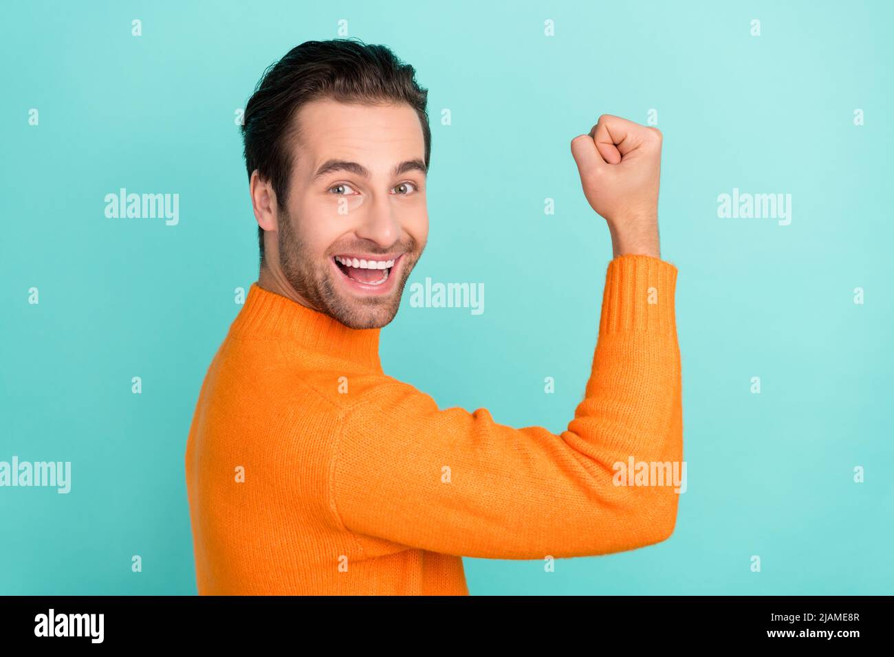 Side profile young man flexing hi-res stock photography and images - Alamy