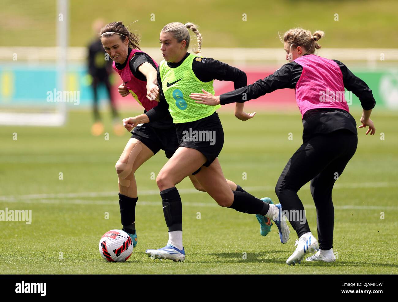 England's Alessia Russo and Jill Scott (left) battle for the ball ...