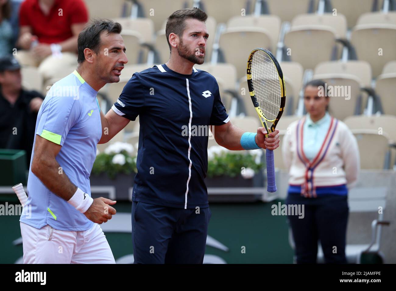 PARIS, IF - 31.05.2022: ROLAND GARROS 2022 - Ivan Dodig (CRO) and ...