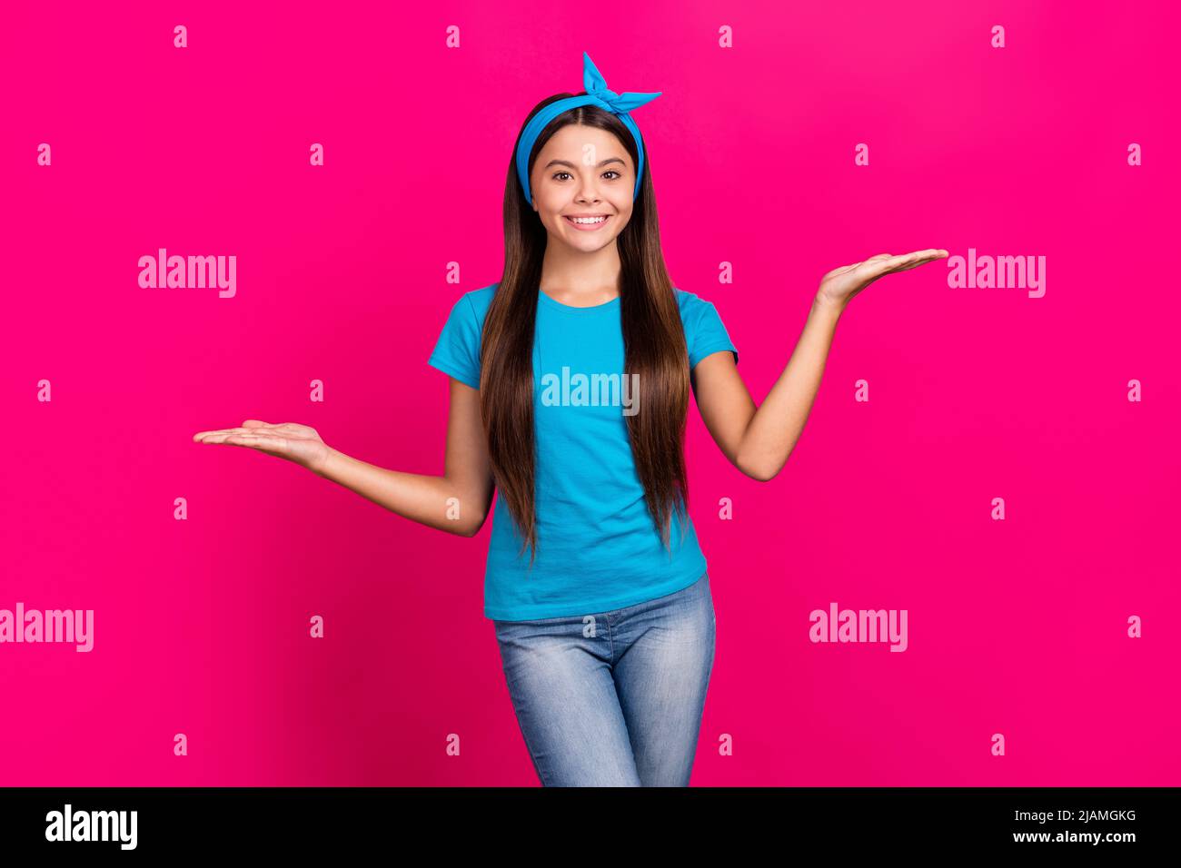 Portrait of attractive trendy cheery girl holding copy space solution ...