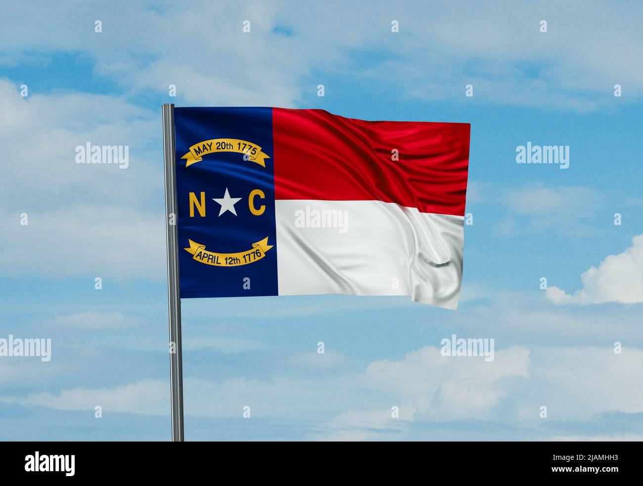 North Carolina US state flag waving in the wind on sky with clouds ...