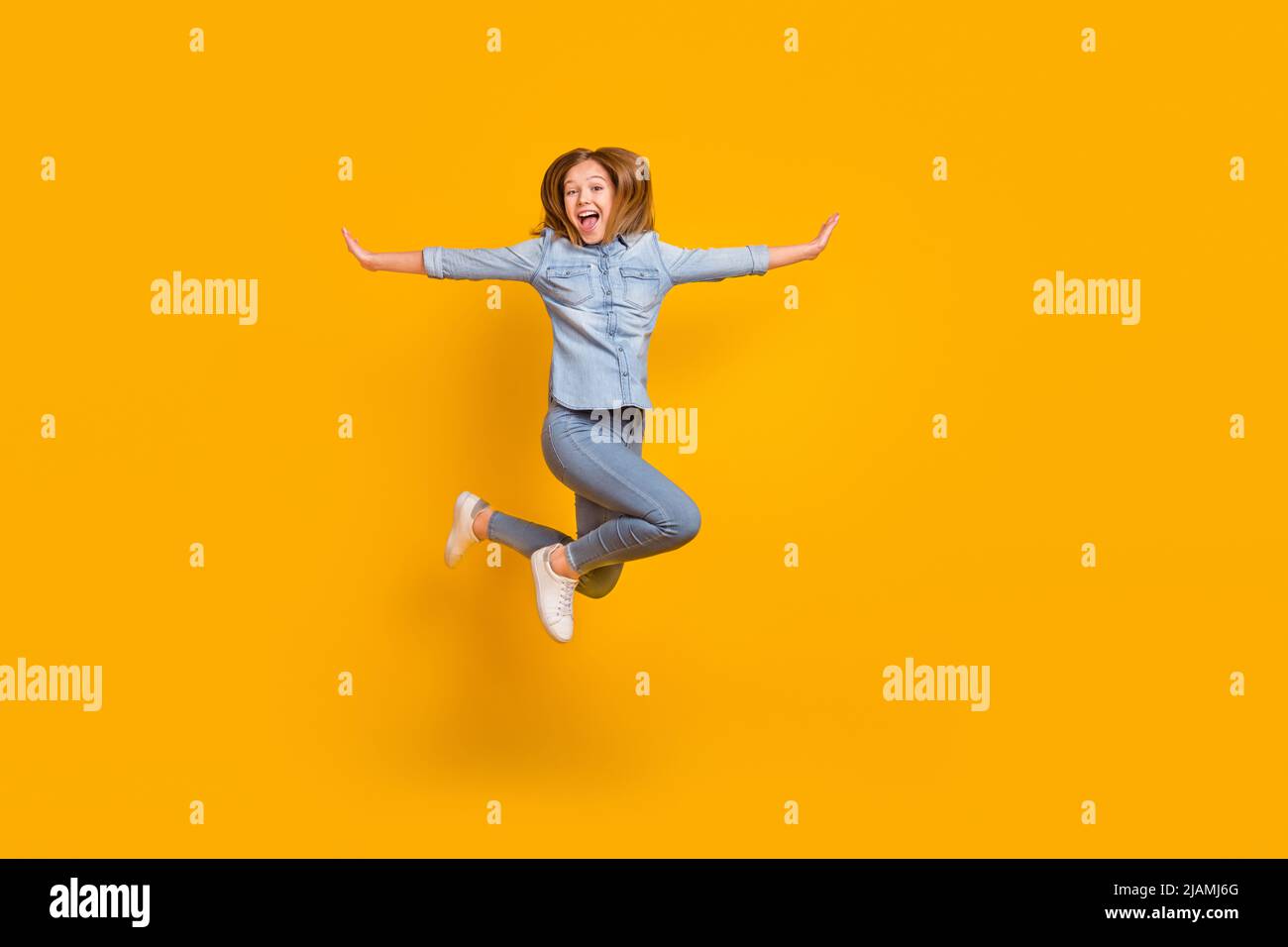 Full body photo of hooray teenager girl jump yell wear bag jeans shirt ...