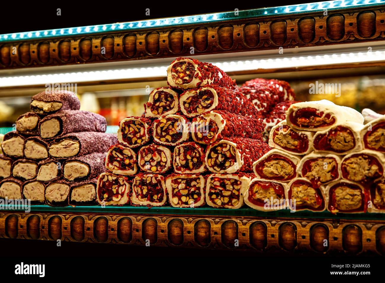 Traditional Turkish delights sweet rolls, Oriental sweets lukum, lokum ...