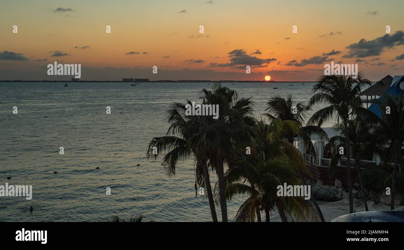 Sunset over sea coconut trees hi-res stock photography and images - Alamy