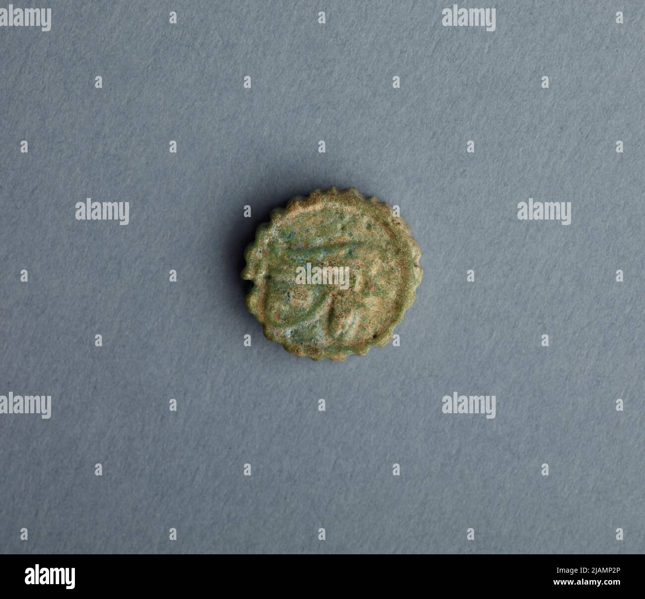 Ancient circular amulet hi-res stock photography and images - Alamy