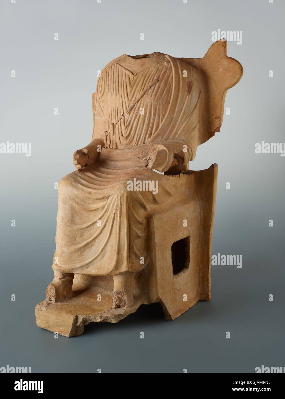 Statue of a Sitting Man Stock Photo - Alamy