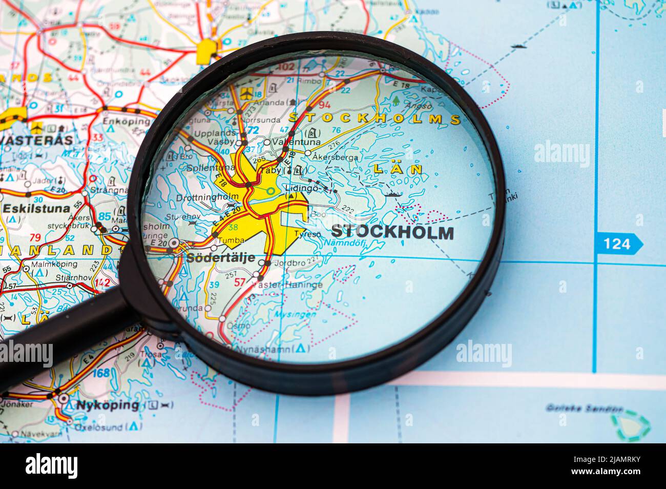 map of Stockholm in Sweden through magnifying glass, concept of ...
