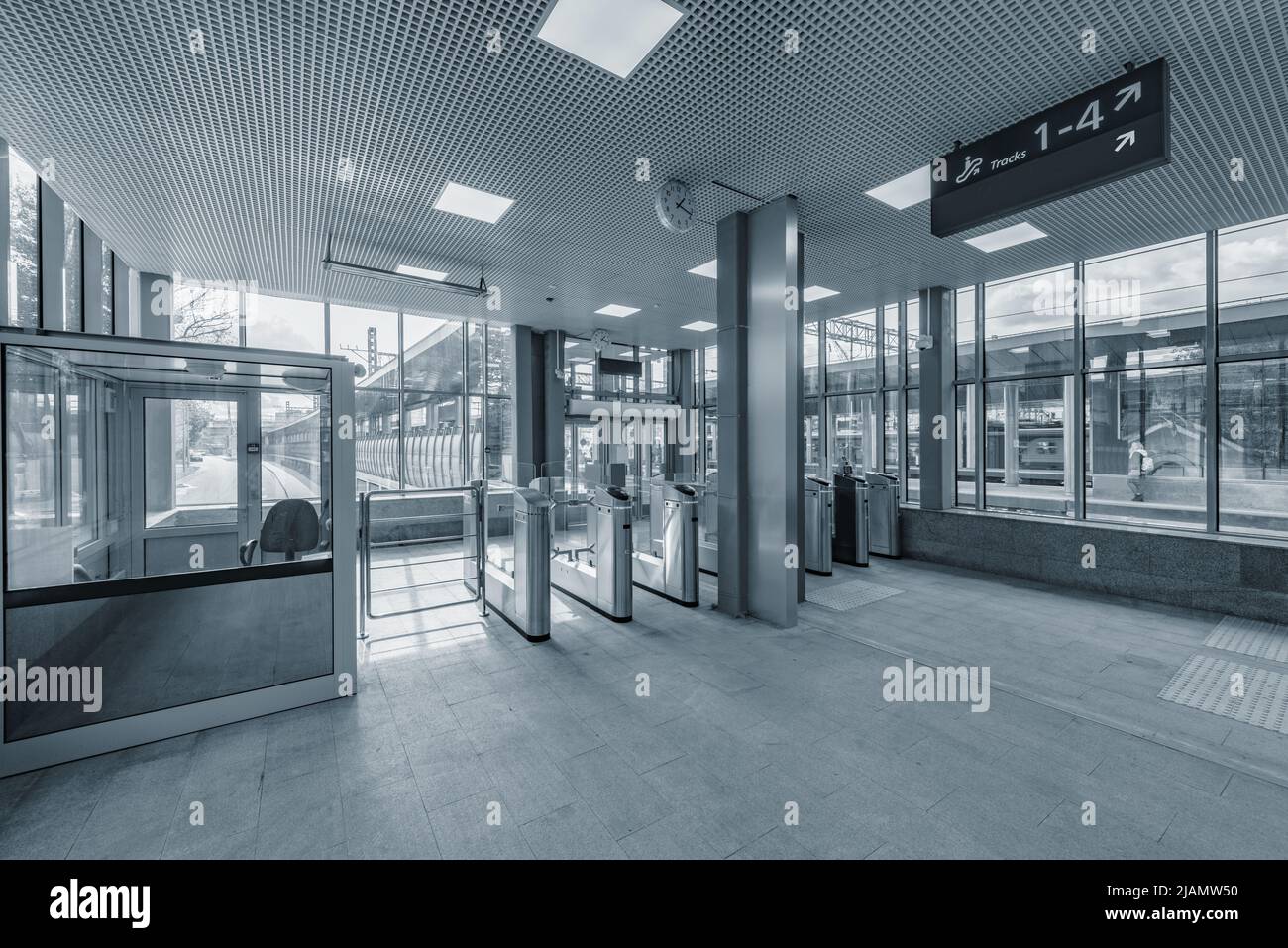Turnstiles with electronic card readers of the station platform Stock ...