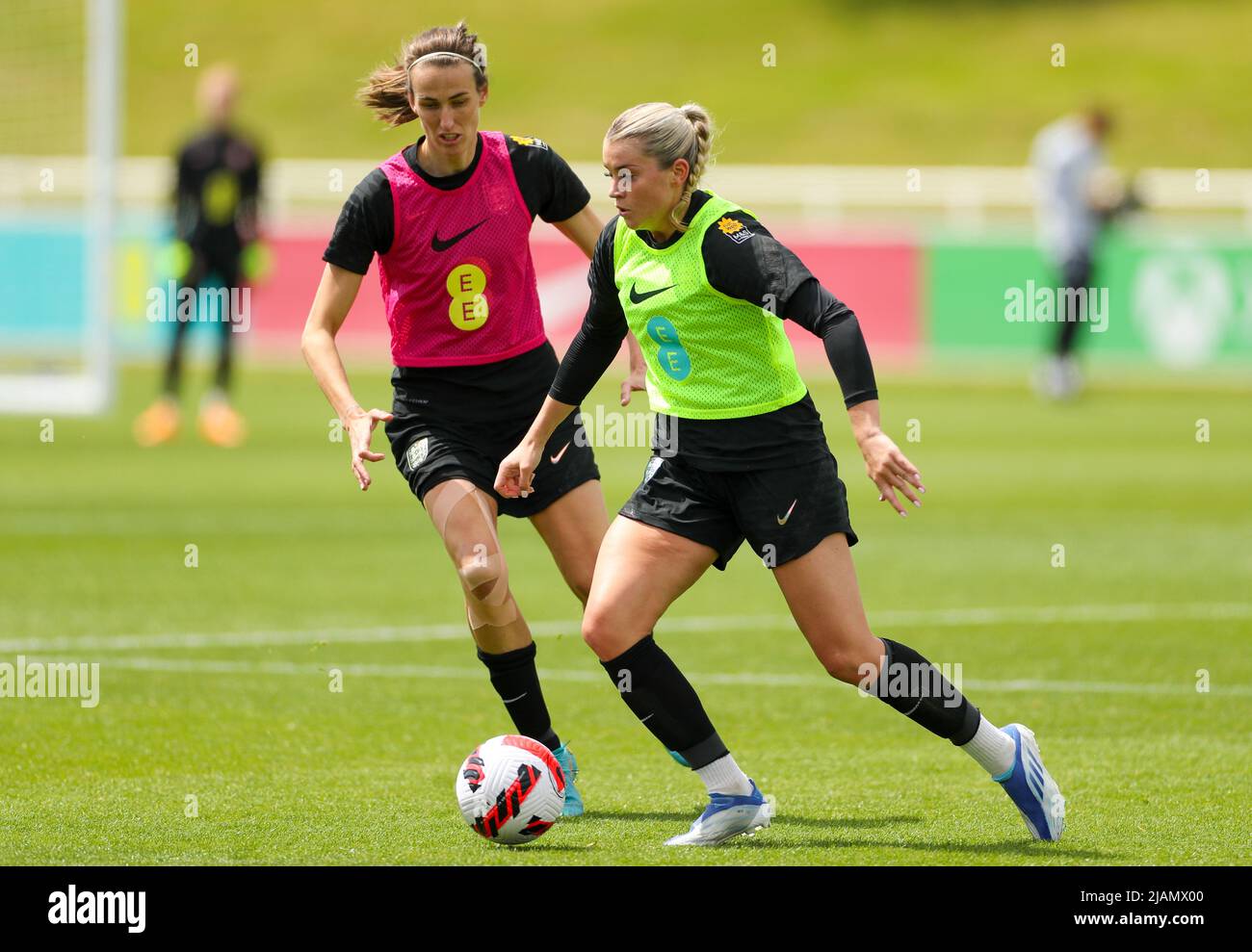 England’s Jill Scott (left) battles with Alessia Russo during a ...