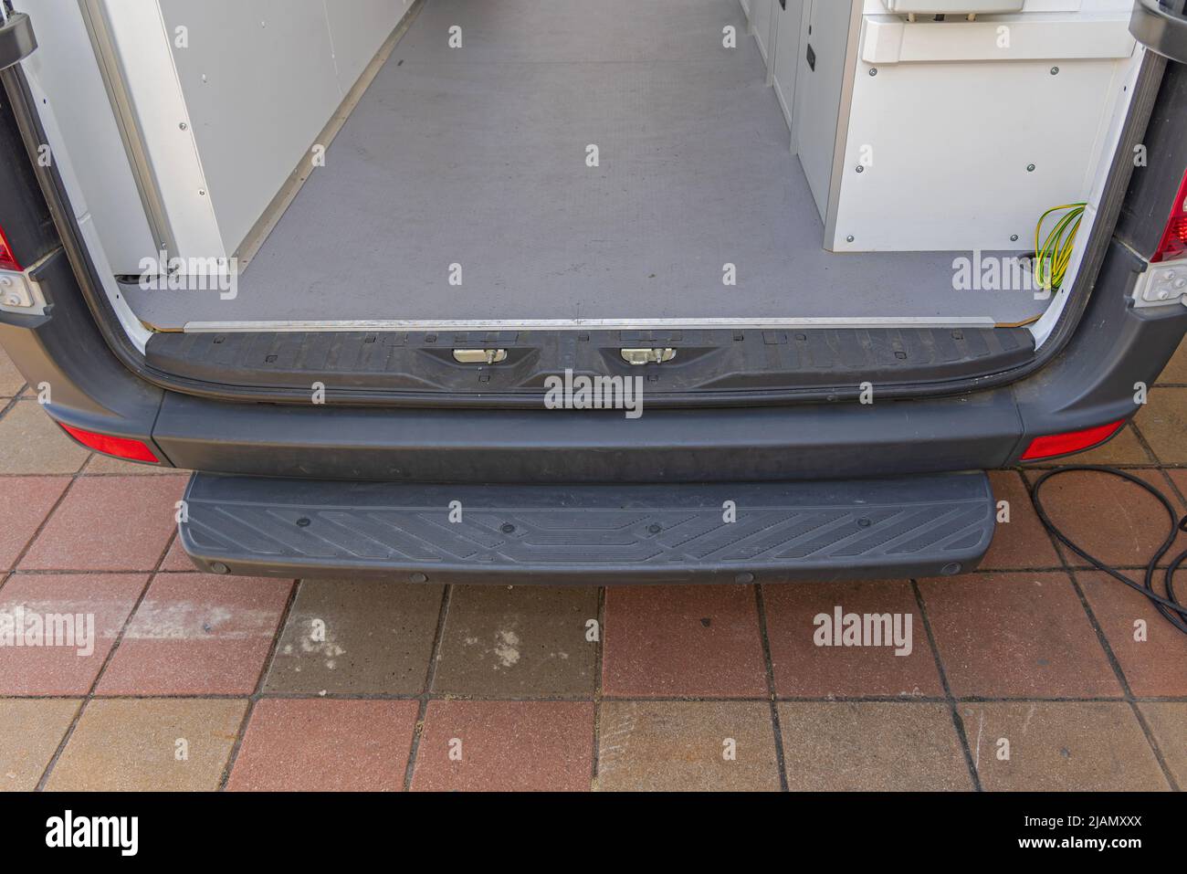 Under Bumper Rear Step in Big Camper Van Vehicle Stock Photo - Alamy
