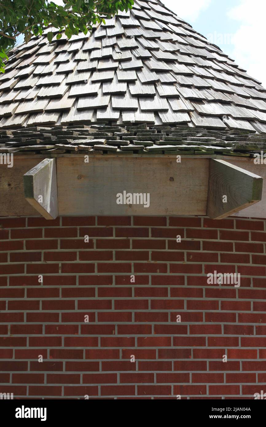 Small tropical brick hut with a thatched roof Stock Photo - Alamy