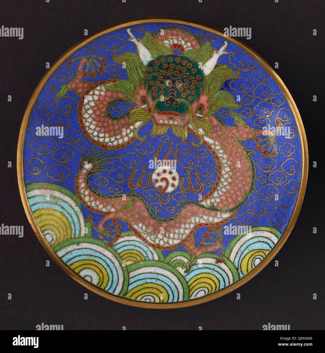 Plate with a dragon on a cobalt blue background unknown Stock Photo - Alamy