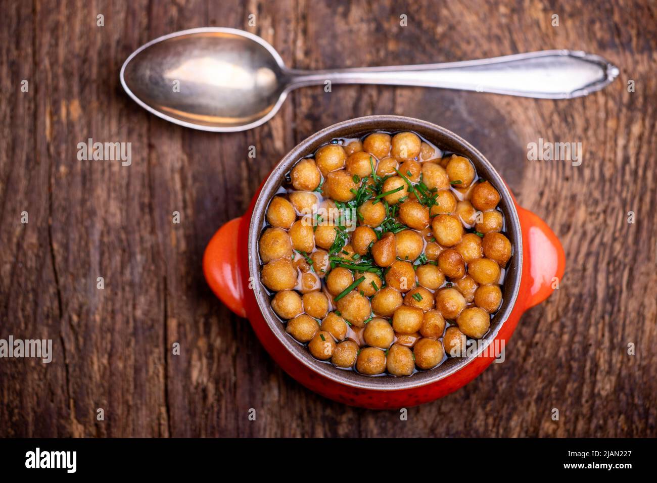 bavarian soup with batter pearls on wood Stock Photo - Alamy
