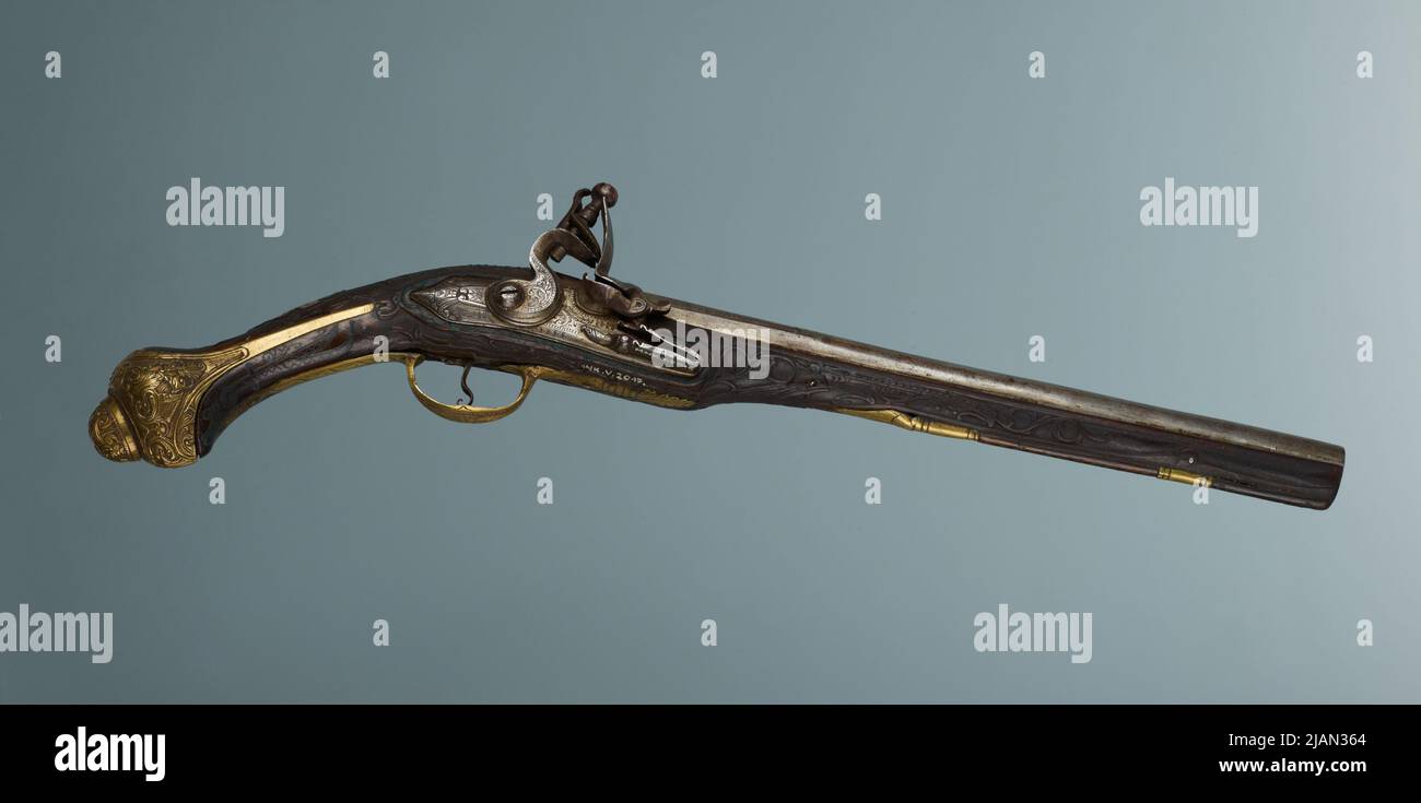 Pistol with a rock castle Stock Photo - Alamy