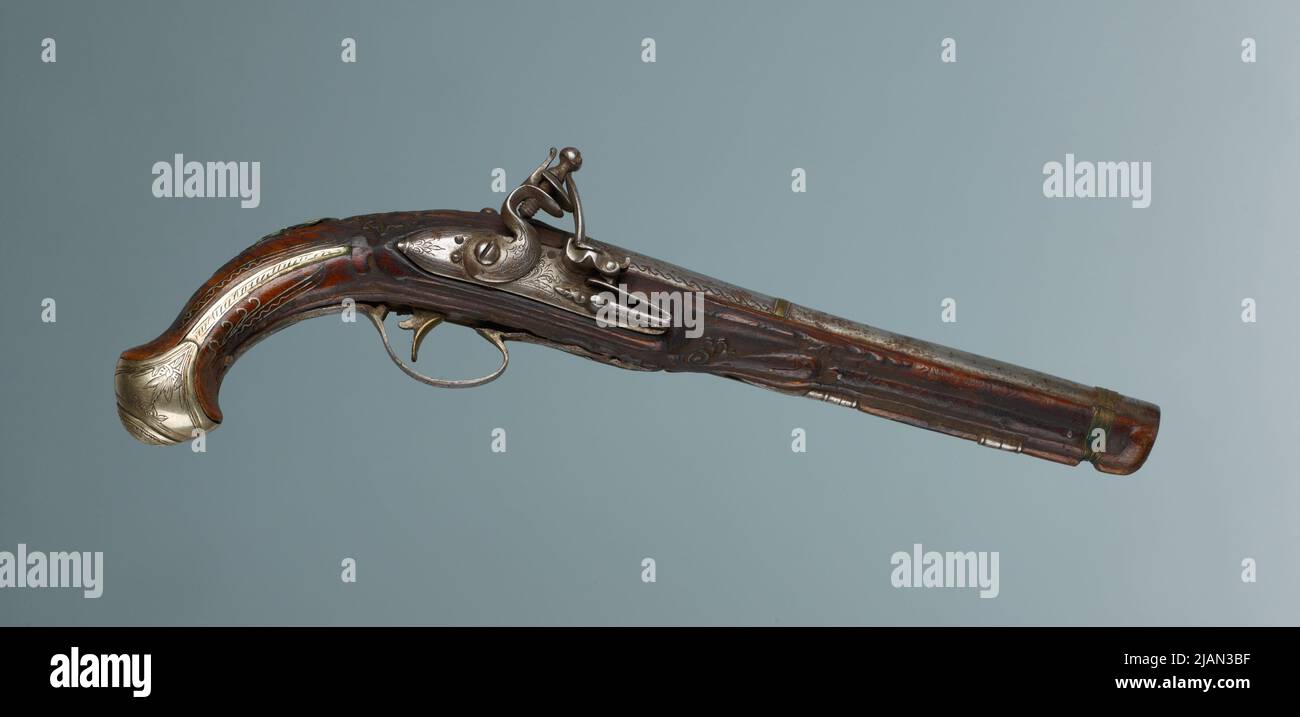 Pistol with a rock castle Stock Photo - Alamy