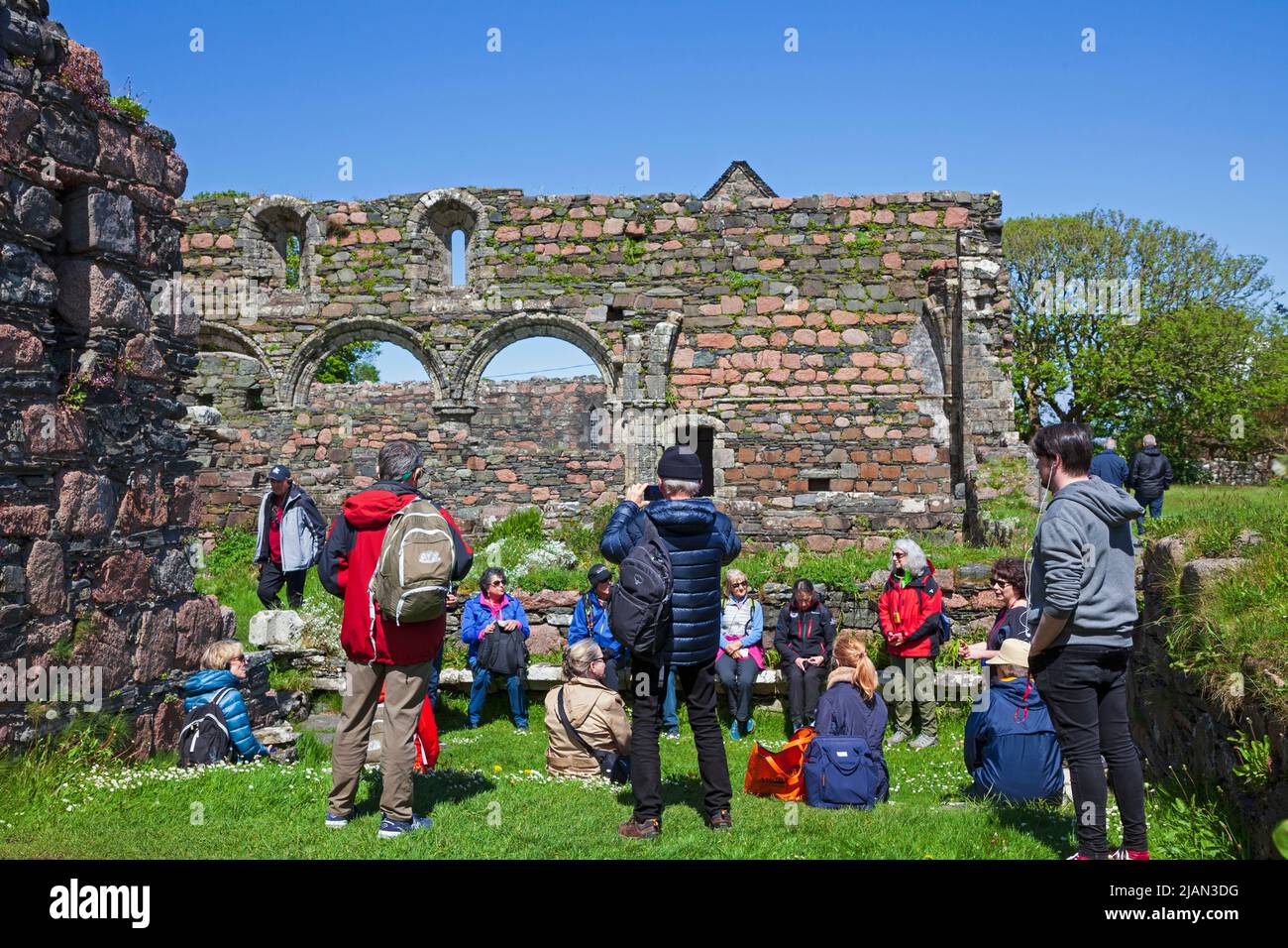 Tourists in Iona Nunnery which housed an Augustinian convent of nuns ...