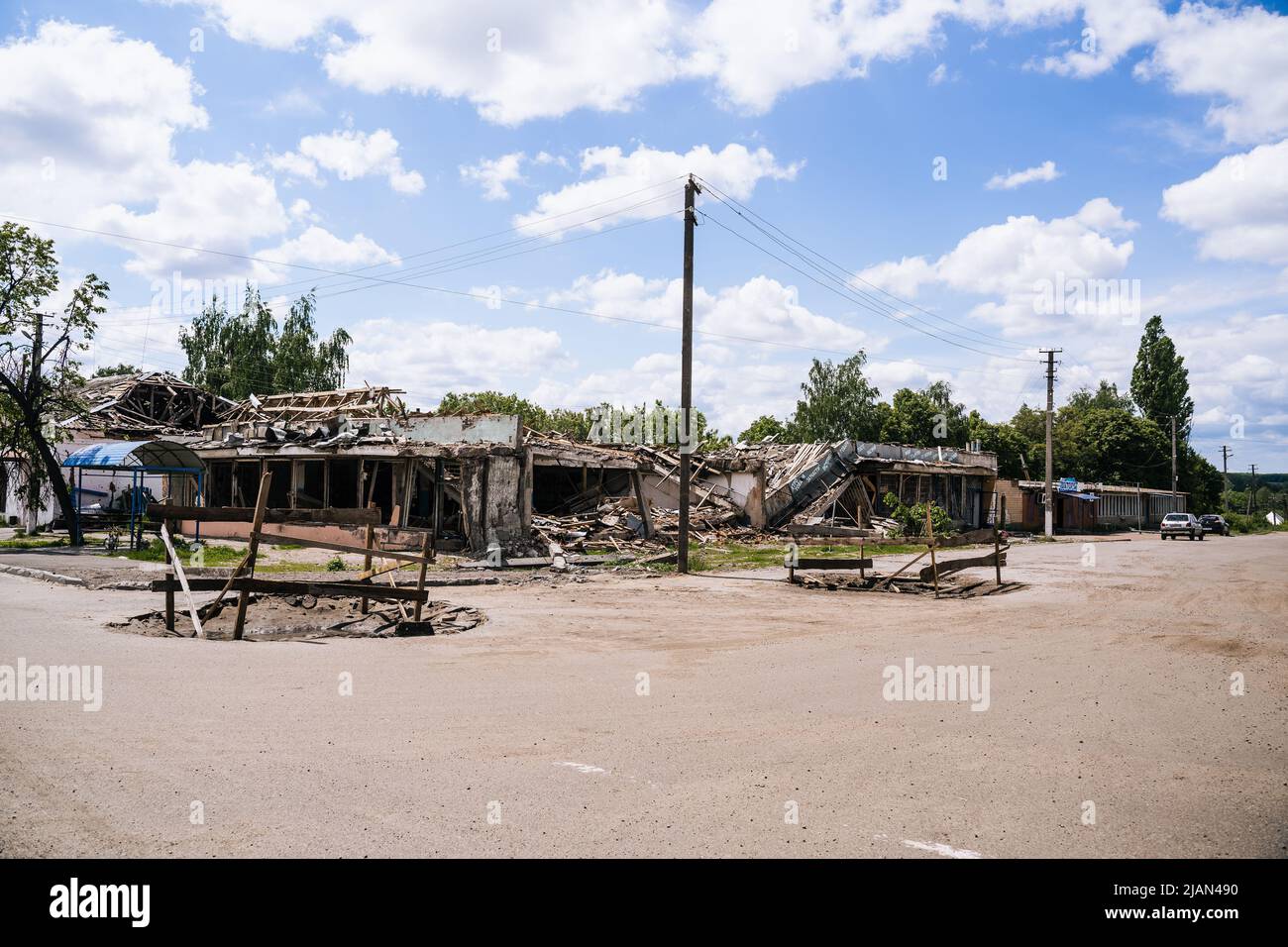 War in Ukraine. Crater from an explosion in the Sumy region. Russia's ...