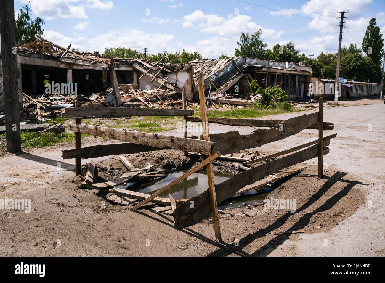 War in Ukraine. Crater from an explosion in the Sumy region. Russia's ...