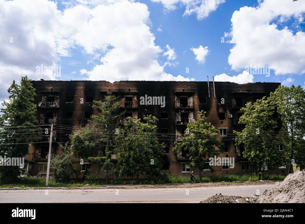 War in Ukraine. A burnt civilian house from the Russian military in the ...