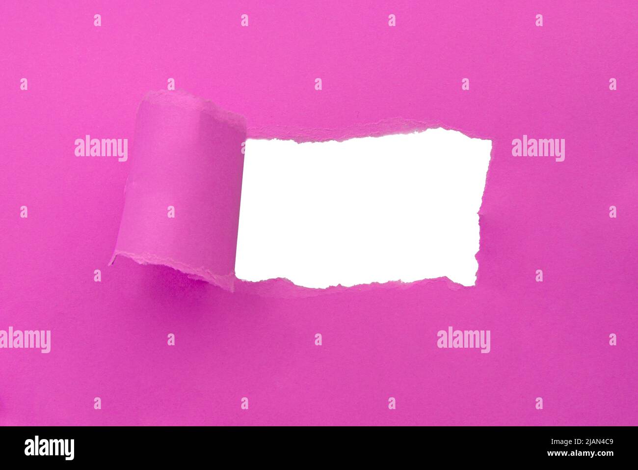 Paper pink color background with hole copyspace Stock Photo - Alamy
