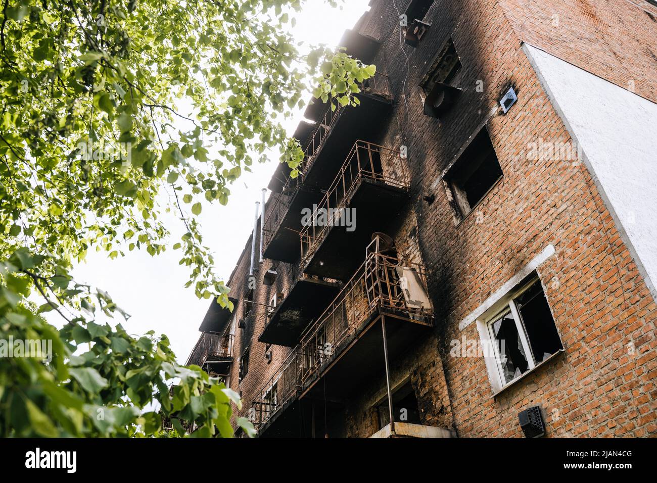 War in Ukraine. A burnt civilian house from the Russian military in the ...
