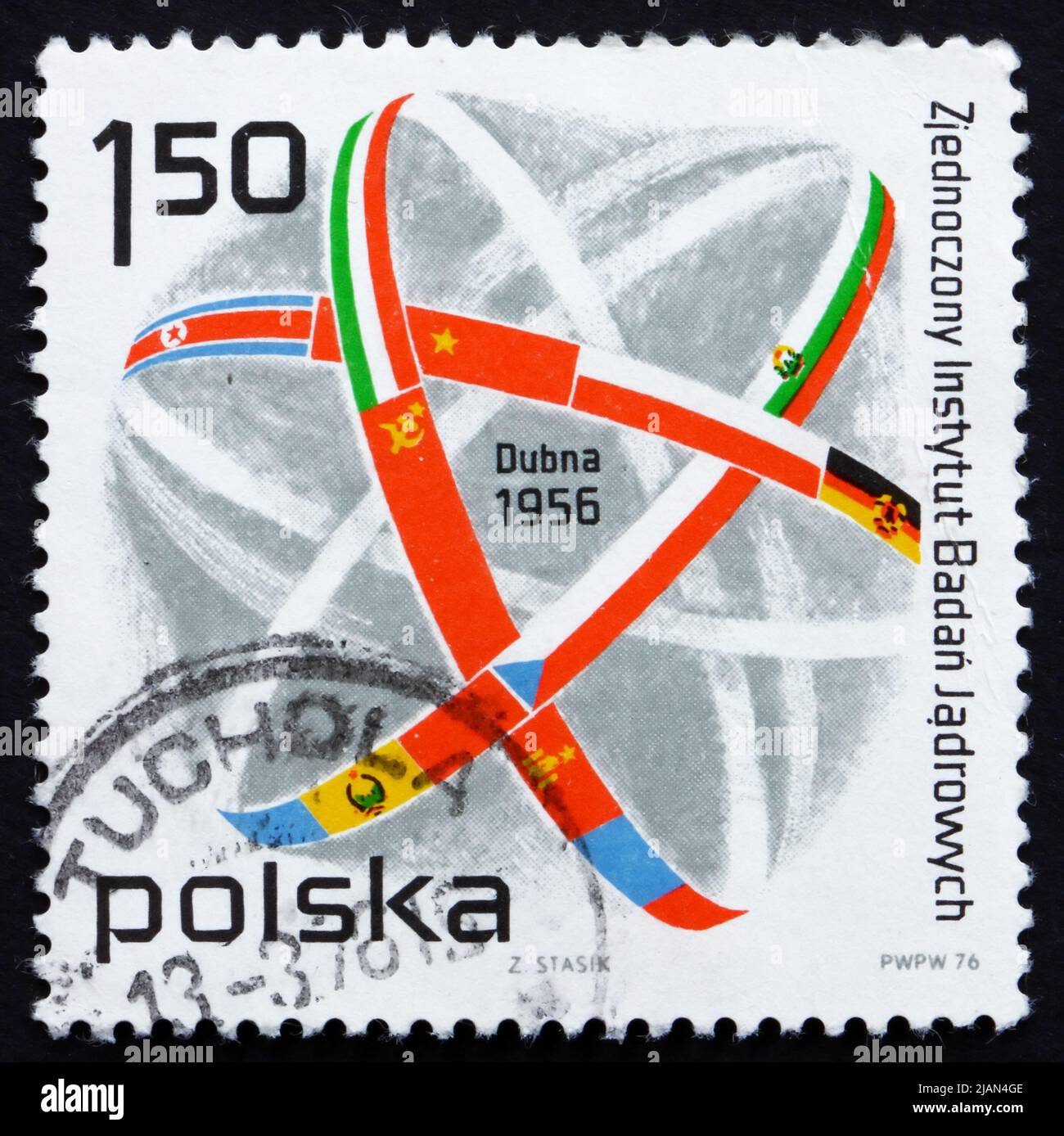 POLAND - CIRCA 1976: a stamp printed in the Poland shows Atom Symbol ...