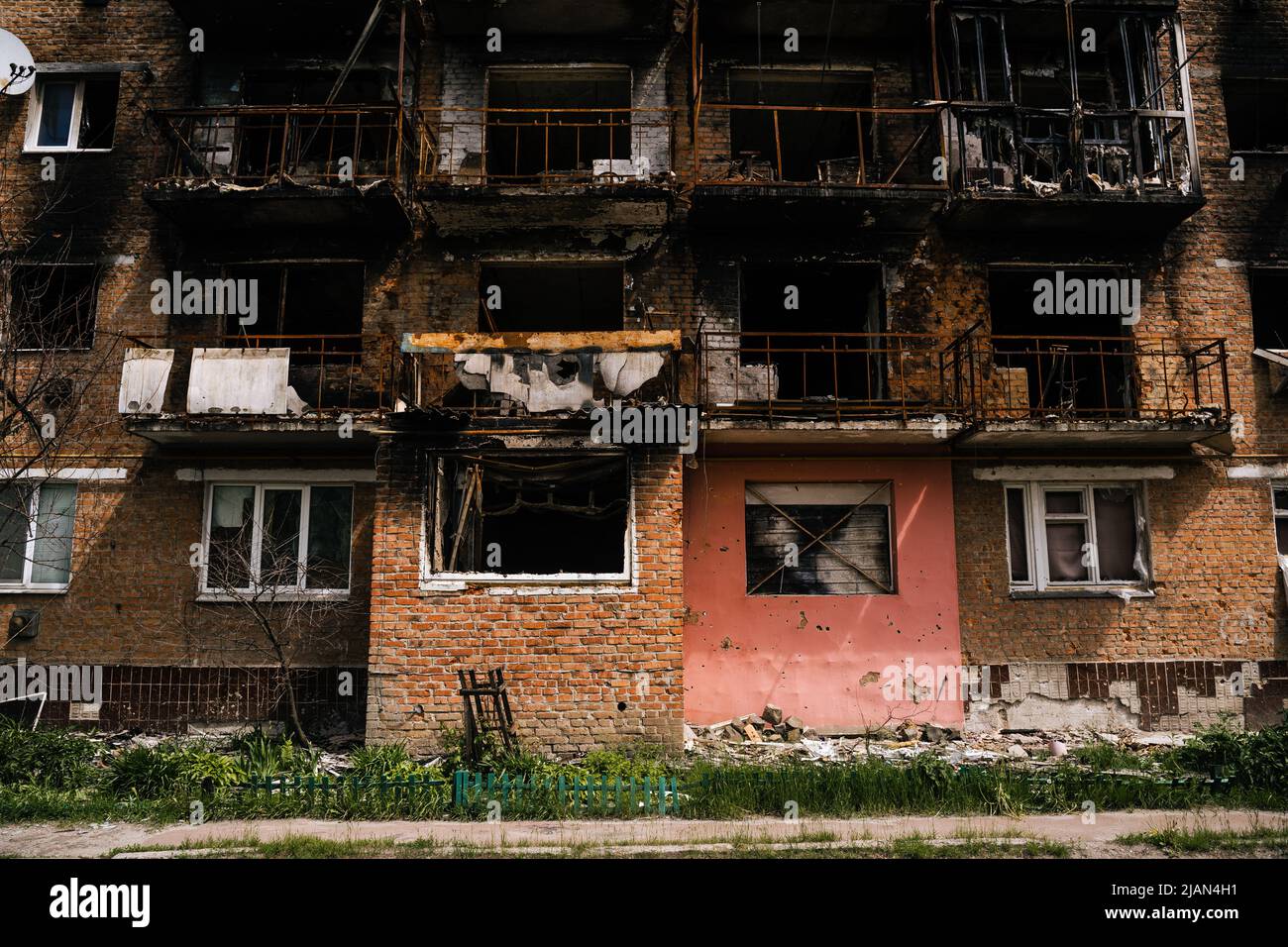 War in Ukraine. A burnt civilian house from the Russian military in the ...