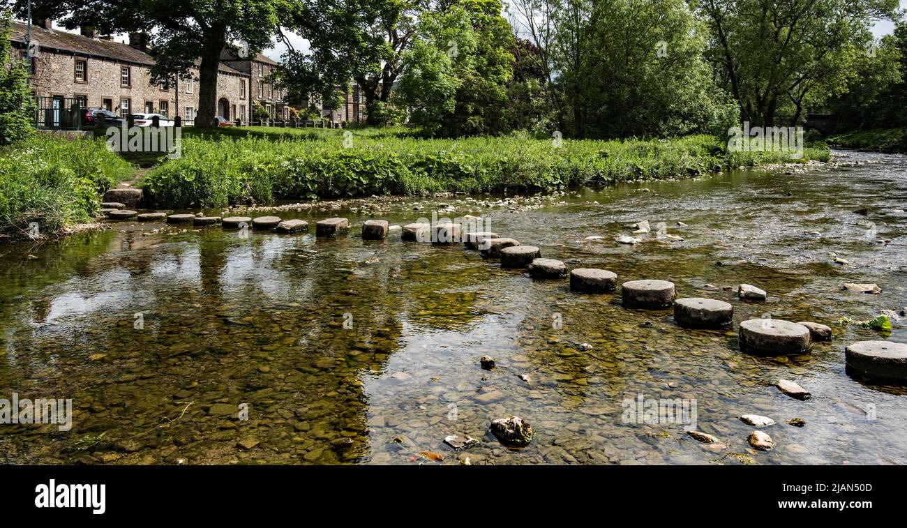 Stepping stones that are well clear of quiet water on he River Aire in ...