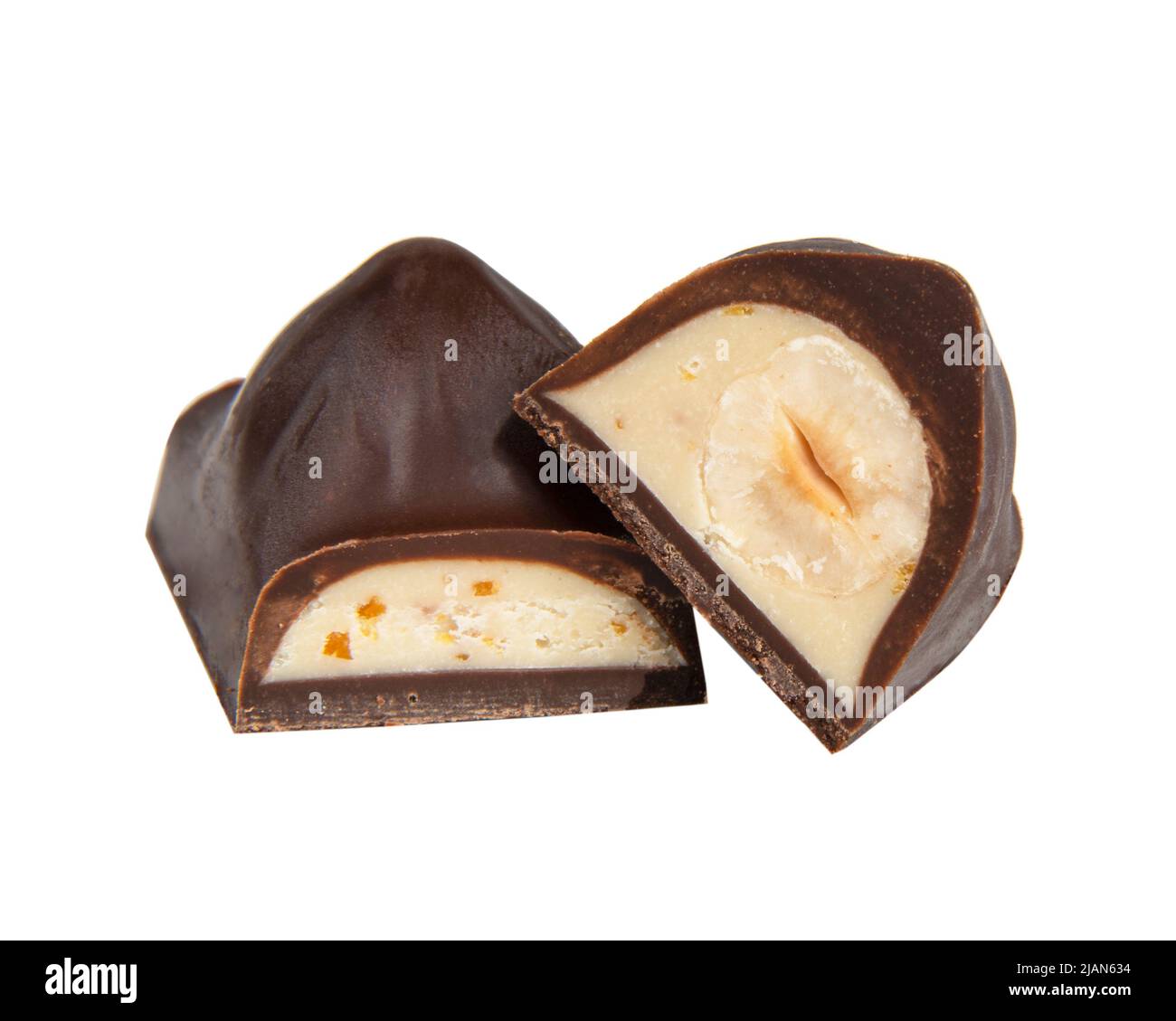 Chocolate sweet candy with nut glazed in half isolated on the white ...