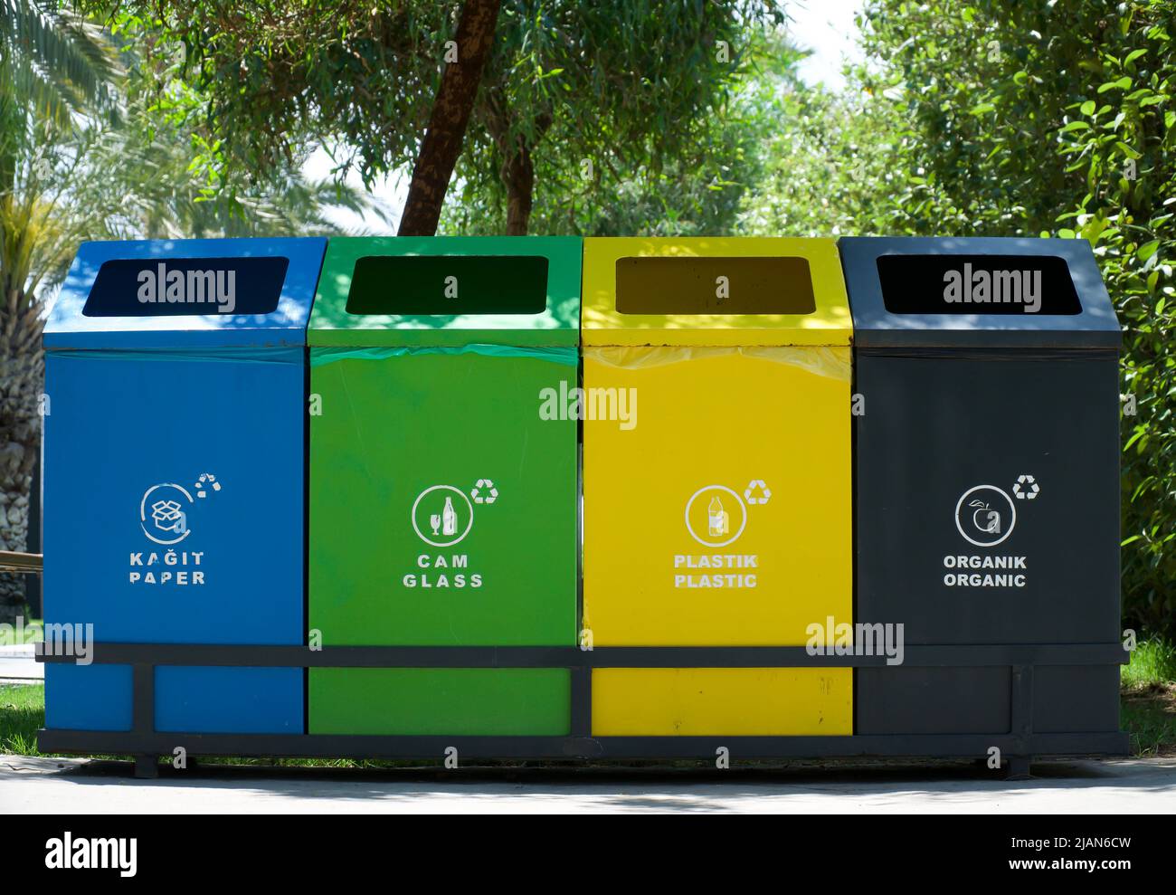 Different colored trash cans with inscriptions paper, plastic, glass ...