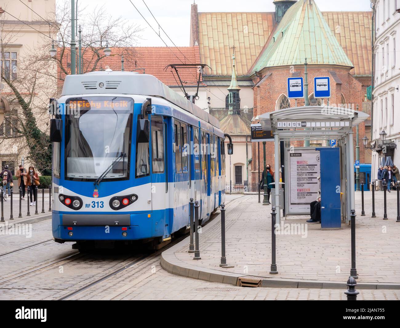 Europe, Krakow, Poland Old Town blue trams at the city centre, means of ...