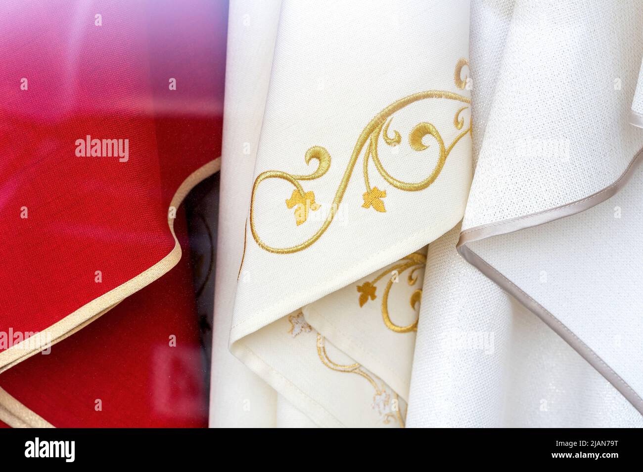 Set of different catholic church priest chasubles, vestments ...