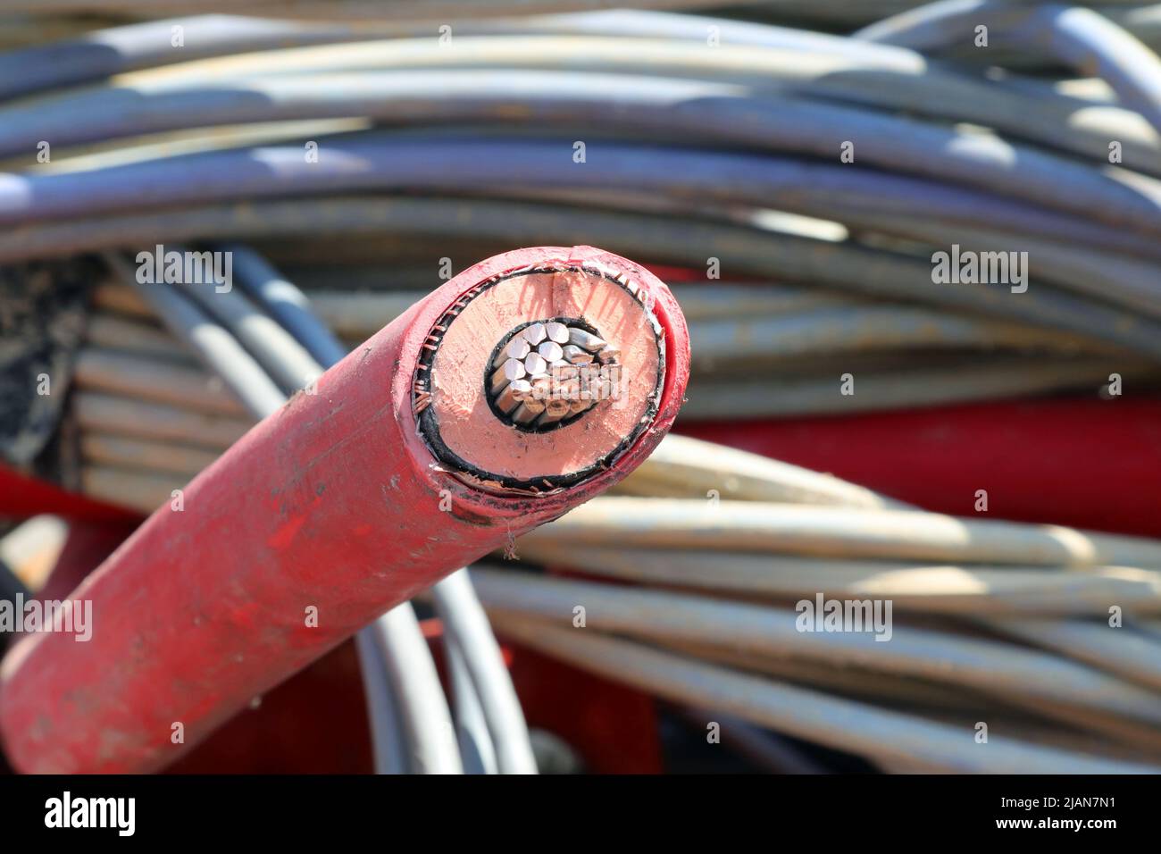 red electric cable for high voltage electricity and you see the inner ...