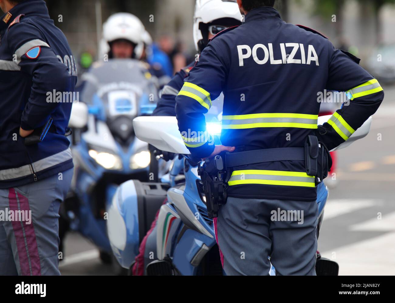 Italian Policeman with the uniform with the text POLIZIA which means ...