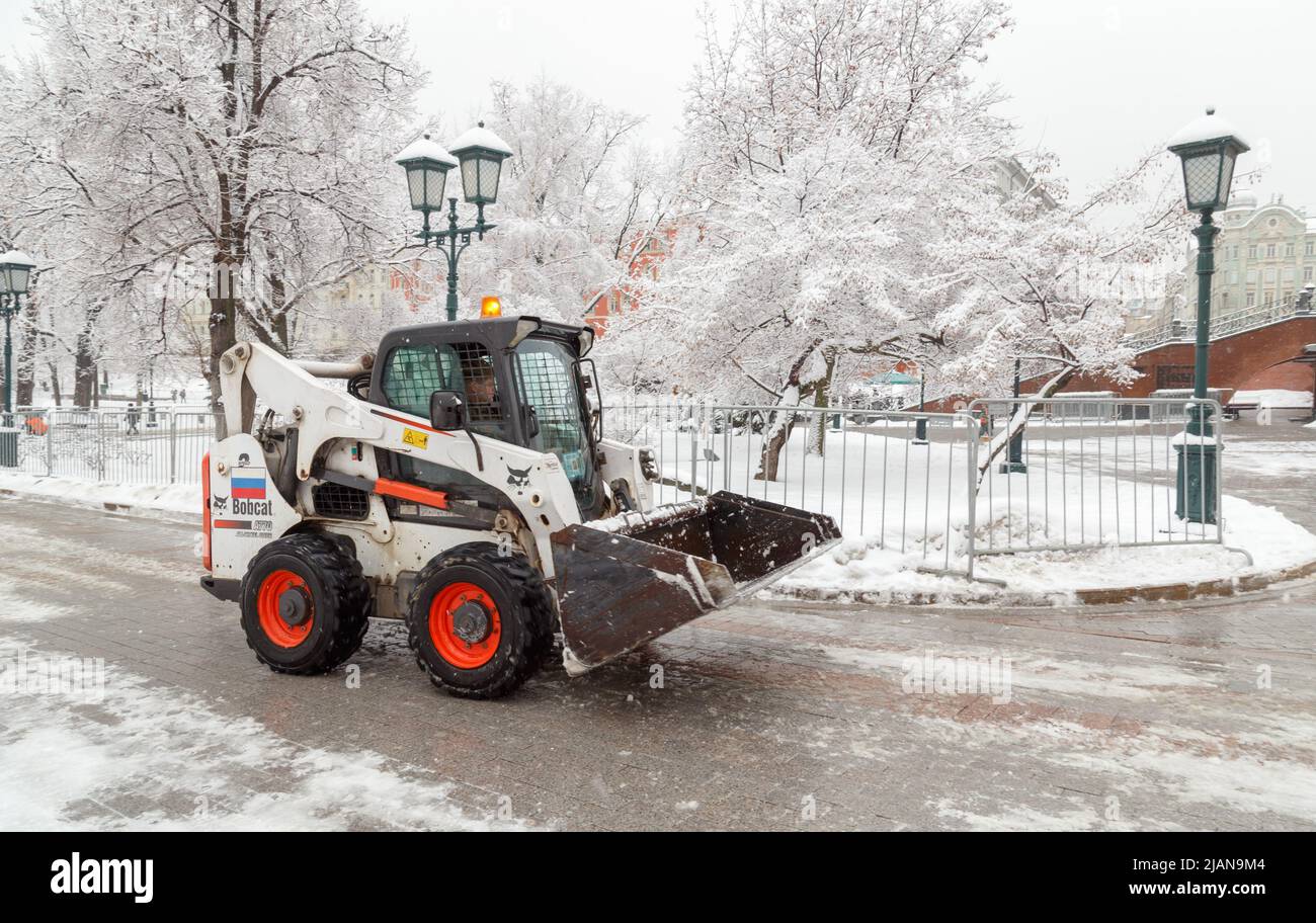 MOSCOW, RUSSIA - FEBRUARY 13,2019: Snow plow cleaning snow from city ...