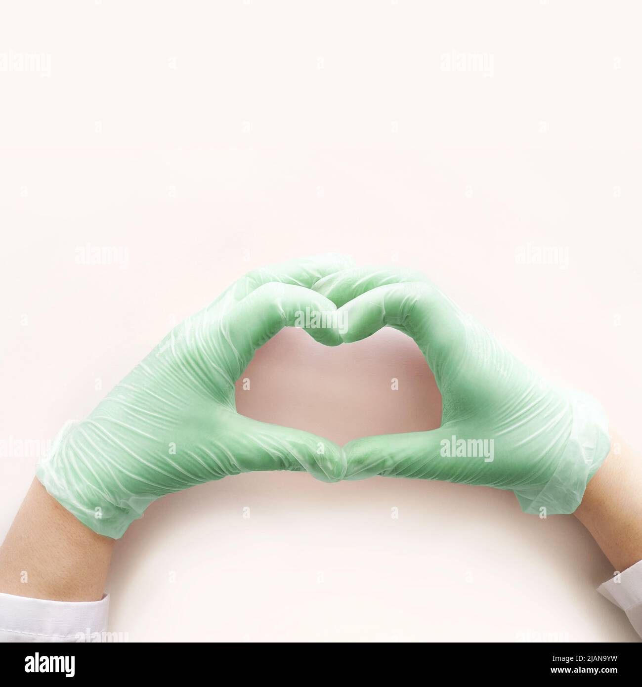 Heart in Medical glove. Surgery doctor hand. Medicine healthcare ...