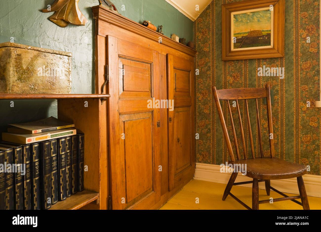 Antique chair and furnishings in main bedroom on upstairs floor inside ...