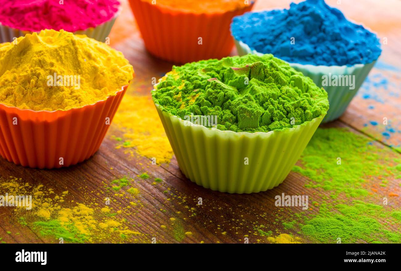 Holi color powder. Organic Gulal colours in bowl for Holi festival ...