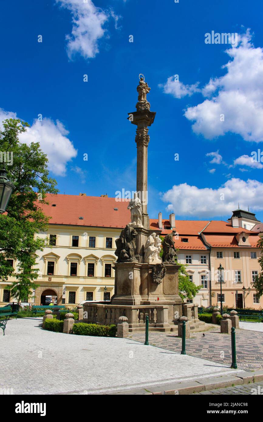 Sandstone Marian Plague Column in Hradčany. Prague town in summer ...