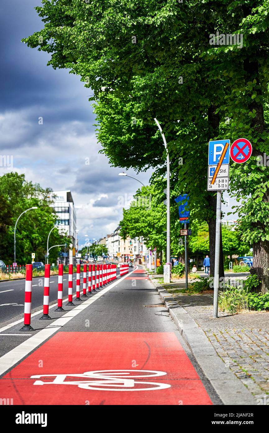 Separated bike lane on a main street in Berlin to improve road safety ...