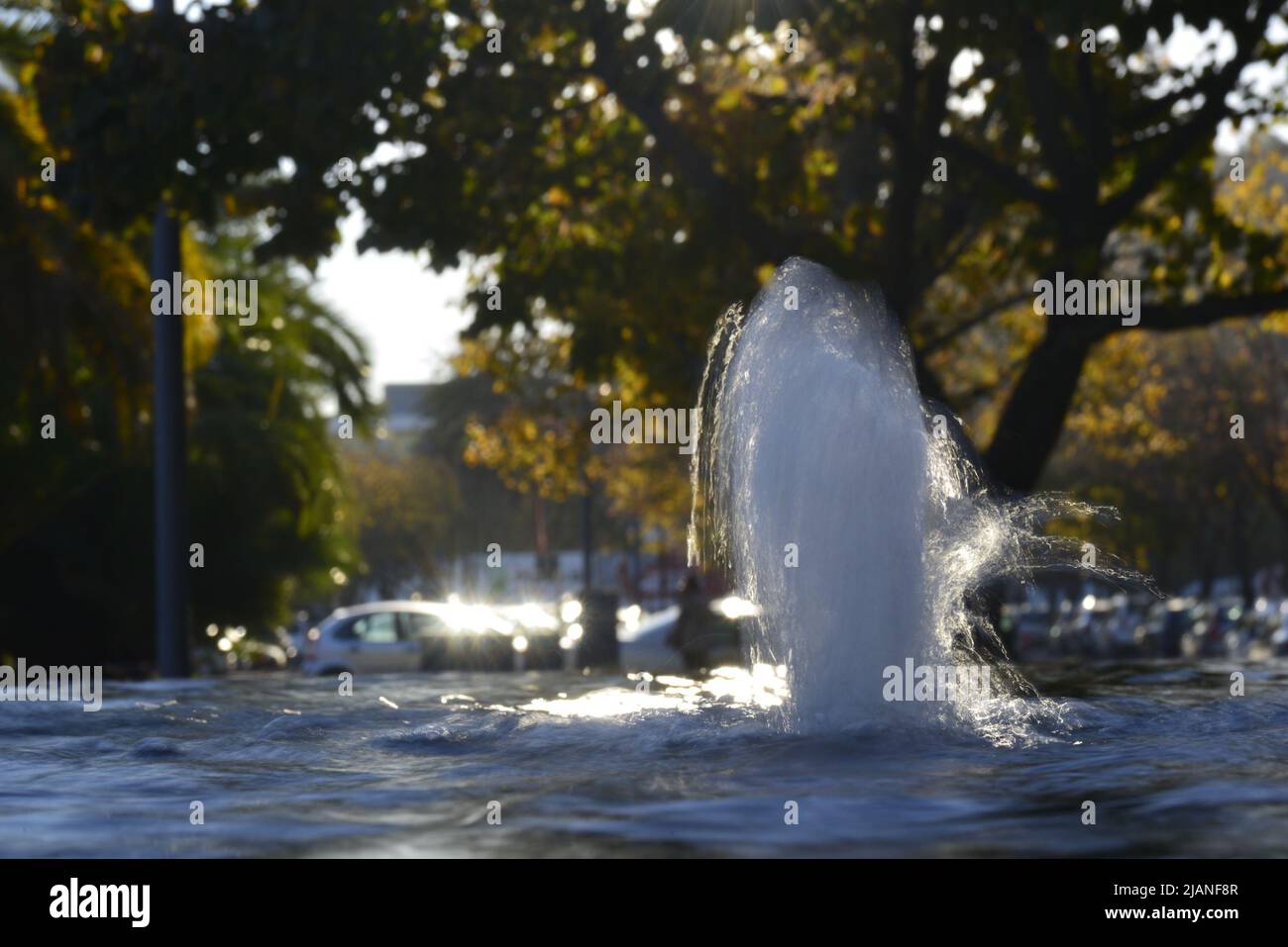 Moving water in the garden fountain Stock Photo - Alamy