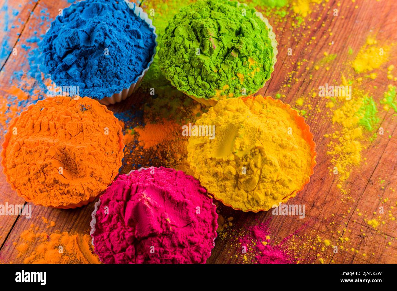 Vivid colorful Holi dye powder in cups. Shallow depth of field Stock ...